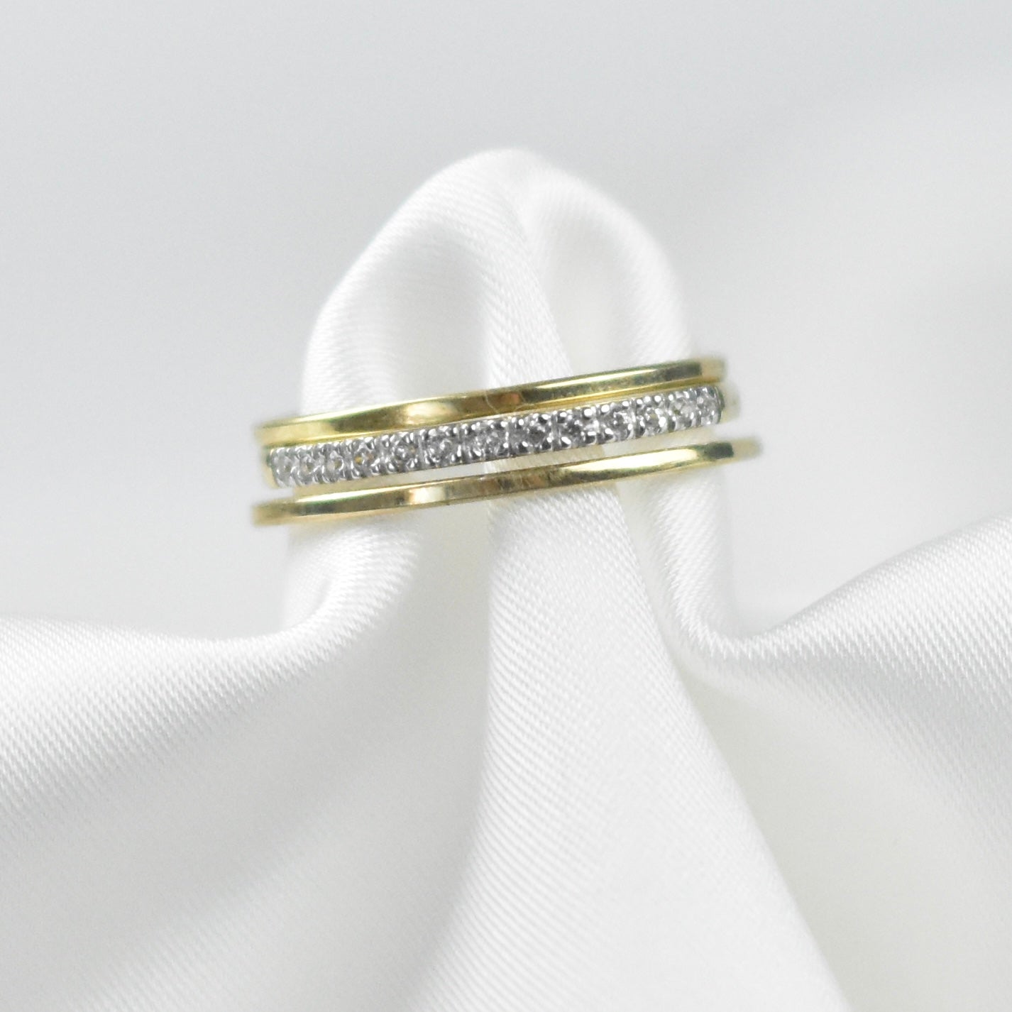 Churumbela con zirconias naturales y oro blanco – C.laretta